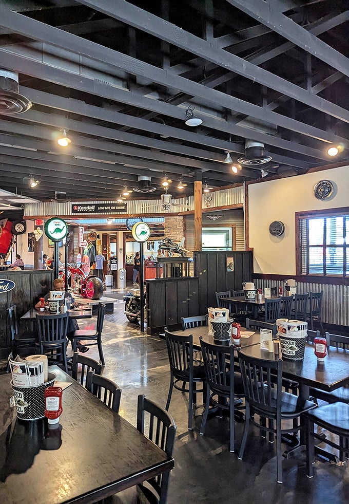Industrial-chic meets biker bar in this surprisingly cozy interior. The exposed beams and motorcycle decor create an atmosphere that's both edgy and welcoming.