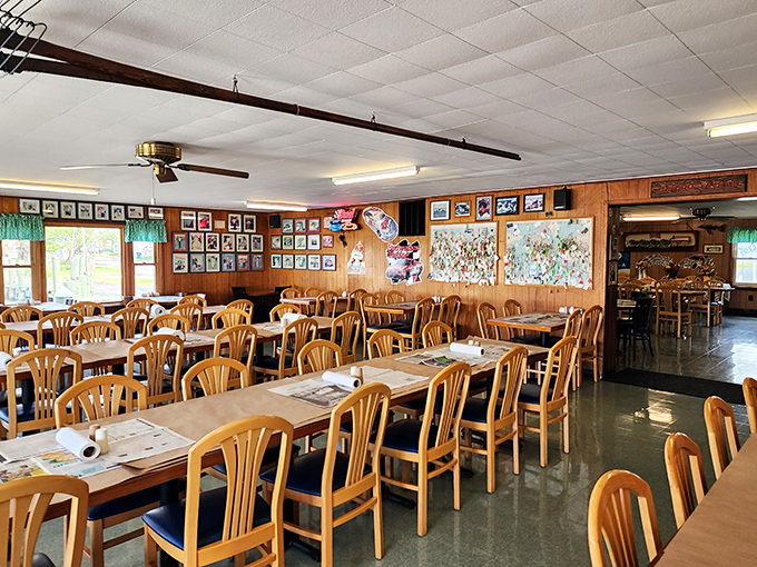Simple wooden tables and chairs set the stage for culinary drama – no distractions needed when the seafood is this spectacular.