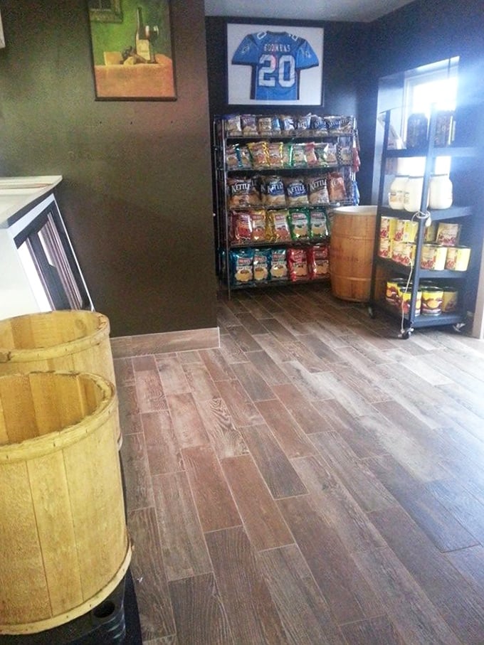 Wooden barrels, rustic flooring, and sports memorabilia create that perfect "been-here-forever" vibe that always signals you've found somewhere special.