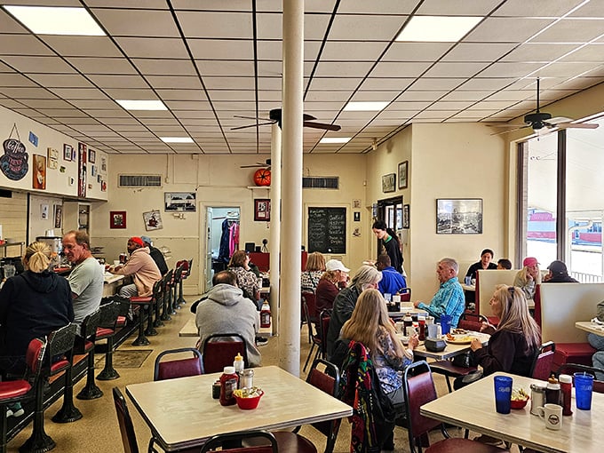 Step inside where comfort food dreams come alive in every vinyl booth corner.