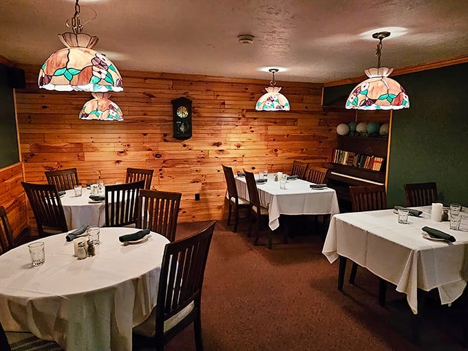Warm pine paneling and Tiffany-style lamps create the perfect lighting – the kind where everyone looks like they've just returned from vacation.