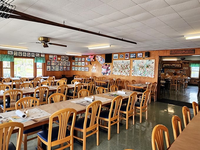 Wooden tables, simple chairs, and walls adorned with decades of memories—this dining room promises seafood without pretension.