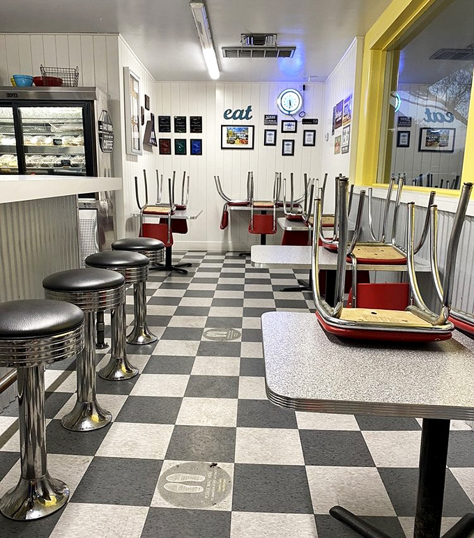Classic Americana in black and white tiles. This isn't retro-chic design; it's a diner that never got the memo that the 1950s ended.