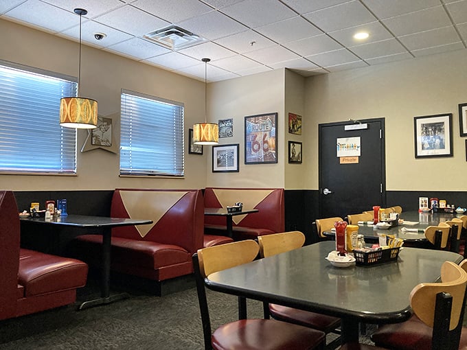 Those burgundy booths have heard more stories than a bartender on New Year's Eve.