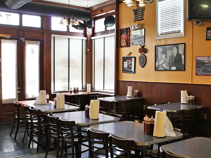Simple tables, warm wood paneling, and walls adorned with memorabilia—this isn't just a restaurant, it's a temple of smoke where barbecue dreams come true.