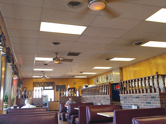 Wood paneling and burgundy booths tell stories of countless family gatherings. This isn't retro by design—it's authentic by survival.