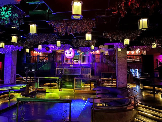Step into a gothic wonderland where purple lighting transforms dinner into pure theater.