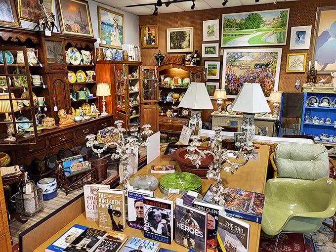 Books, lamps, and collectibles create a cozy tableau that feels less like shopping and more like visiting a fascinating friend's home.