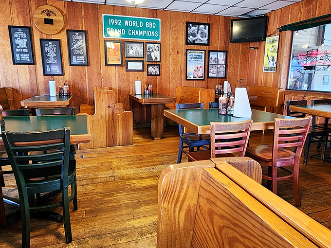 Trophy-lined walls tell stories of barbecue glory. That "1992 World BBQ Grand Champions" sign isn't just decoration—it's a promise.