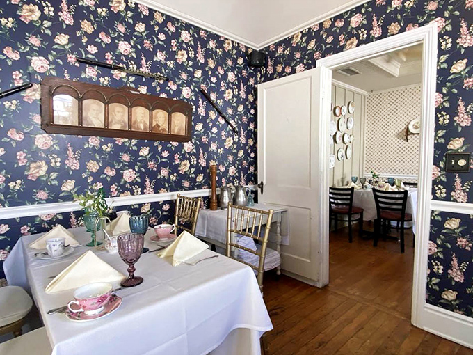 Navy floral wallpaper creates the perfect backdrop for proper tea service. Grandma would approve, and so would the Queen.