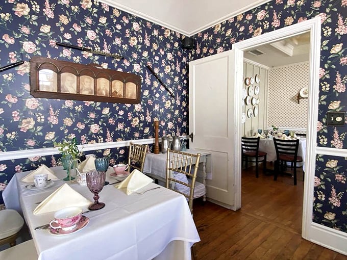 Navy floral wallpaper creates the perfect backdrop for proper tea service. Grandma would approve, and so would the Queen.