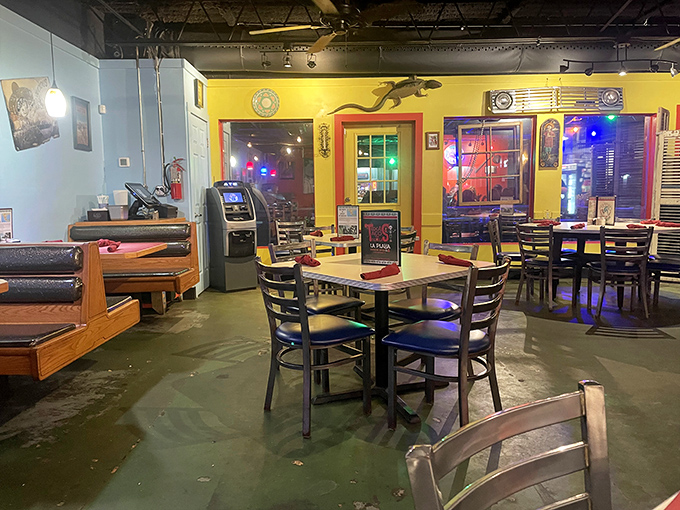 Where sunshine meets seaside dining. The interior's bold yellow walls and playful lizard artwork create the perfect backdrop for your coastal Mexican feast.