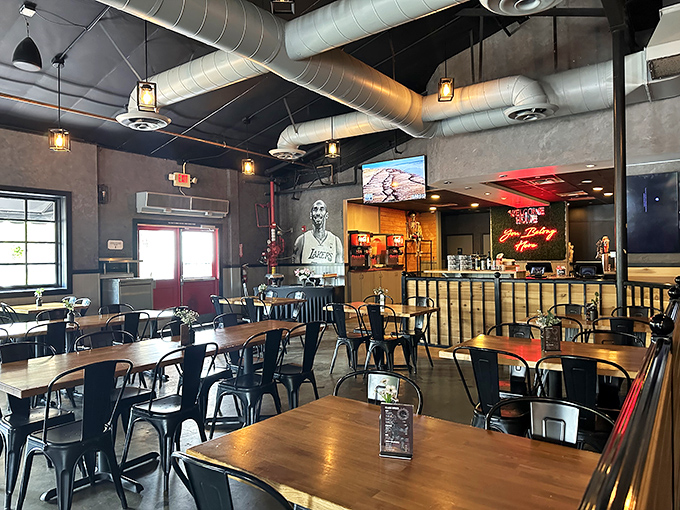 Industrial chic meets comfort food paradise – those pendant lights have witnessed countless moments of pure brisket bliss.