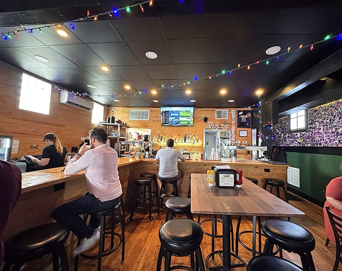 String lights dance across the ceiling while patrons belly up to the wooden bar. This cozy interior practically whispers, "Stay awhile, the burgers are worth it."