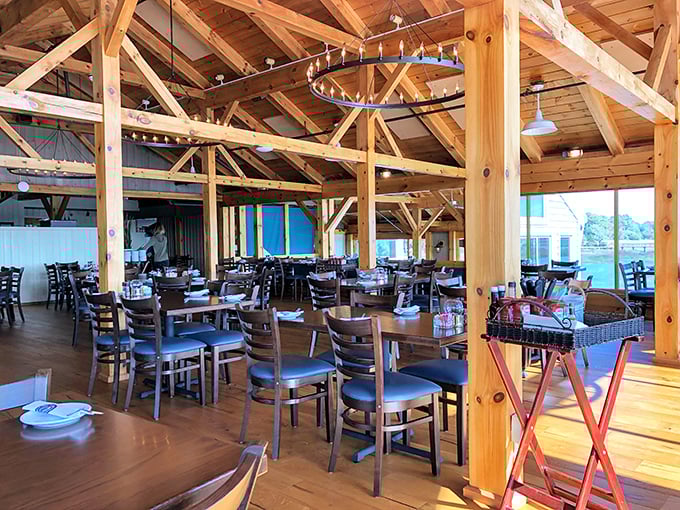 Soaring timber beams and natural light create a cathedral-like dining space that honors Hilton Head's maritime heritage while elevating your seafood experience.
