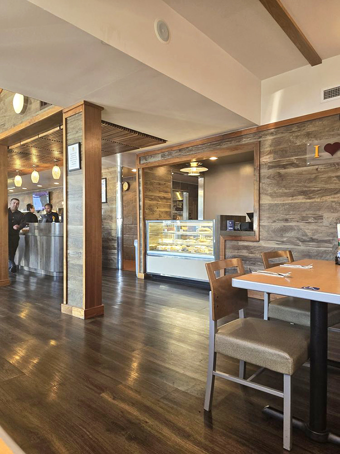 Warm wooden accents and natural light create that perfect "I could stay here all day" atmosphere that great diners have mastered. 