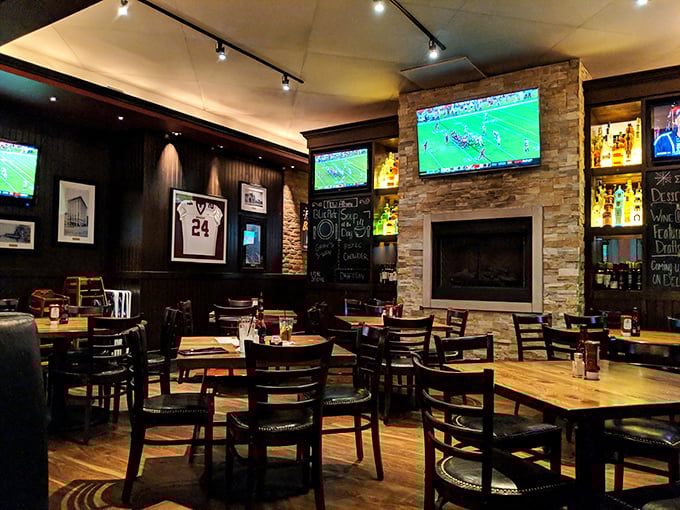 Where sports bar energy meets family restaurant warmth. The stone fireplace and wood tones create that elusive "I could stay here all afternoon" vibe.