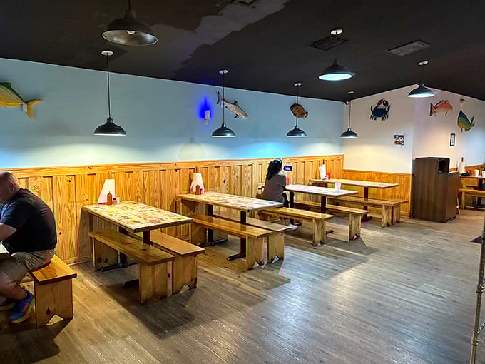 Simple wooden tables and fish-adorned walls create that perfect "I've discovered something special" atmosphere. The kind of place where calories don't count and seafood dreams come true.