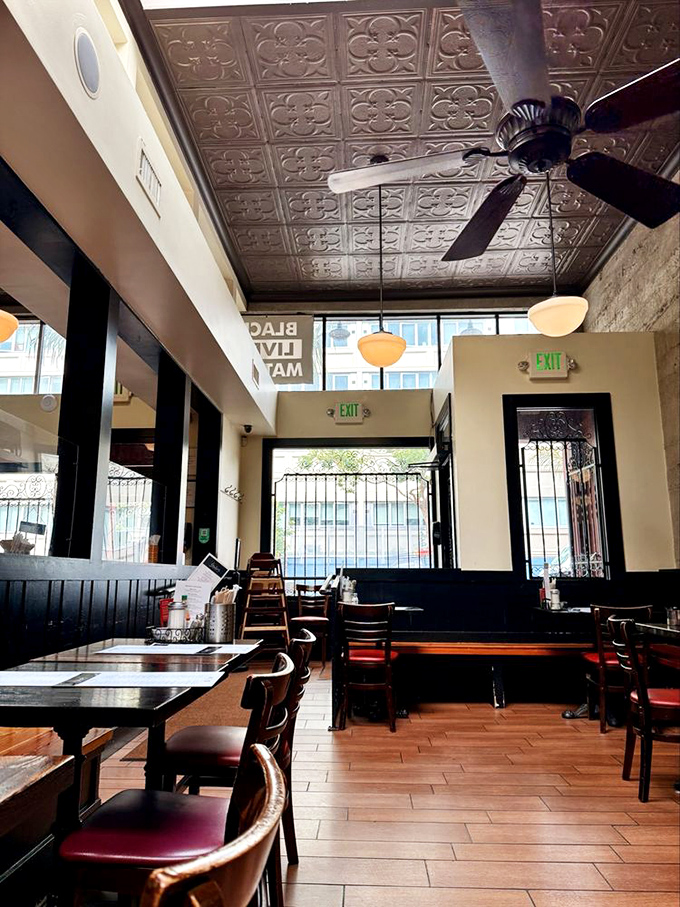 Ornate tin ceiling tiles and warm wooden accents create that perfect New Orleans ambiance – minus the humidity that would ruin your hairdo.