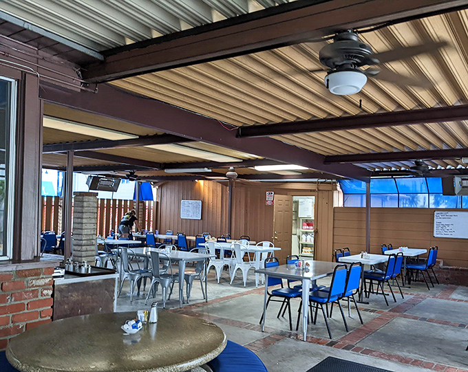 Inside, simplicity reigns supreme. No pretension, just honest dining spaces where conversations flow as freely as the coffee.