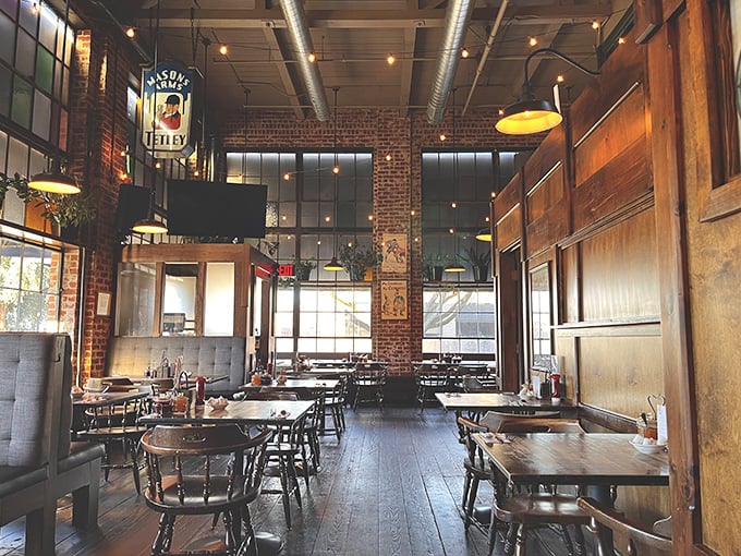 Step inside and time-travel across the Atlantic – exposed brick, wooden beams, and that unmistakable pub atmosphere that makes you want to order a pint before noon.
