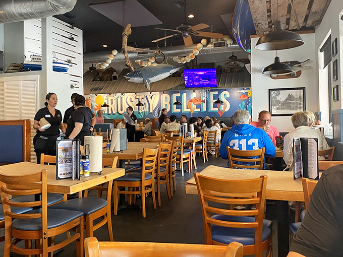 Inside, nautical charm meets serious seafood business. That shark overhead isn't just decoration—it's keeping an eye on who orders the freshest catch.