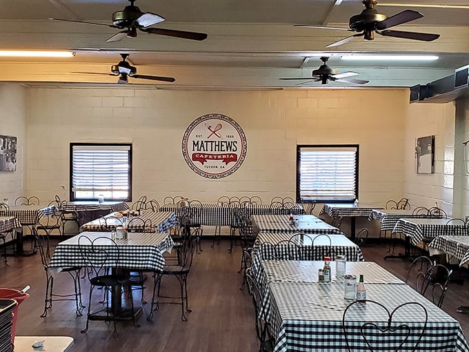 Black and white checkered tablecloths aren't a design choice—they're a tradition. This dining room has witnessed countless family gatherings and first dates since Eisenhower was president.