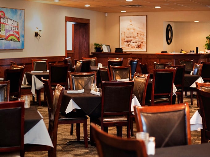 Classic steakhouse ambiance done right: leather chairs, white tablecloths, and lighting that's romantic yet practical. You'll actually see what you're eating!