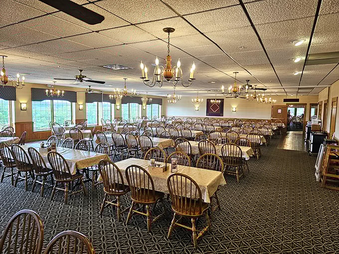Wooden Windsor chairs and chandeliers create an atmosphere that whispers, "Slow down, stay awhile." The dining room practically demands you loosen your belt before you even order.