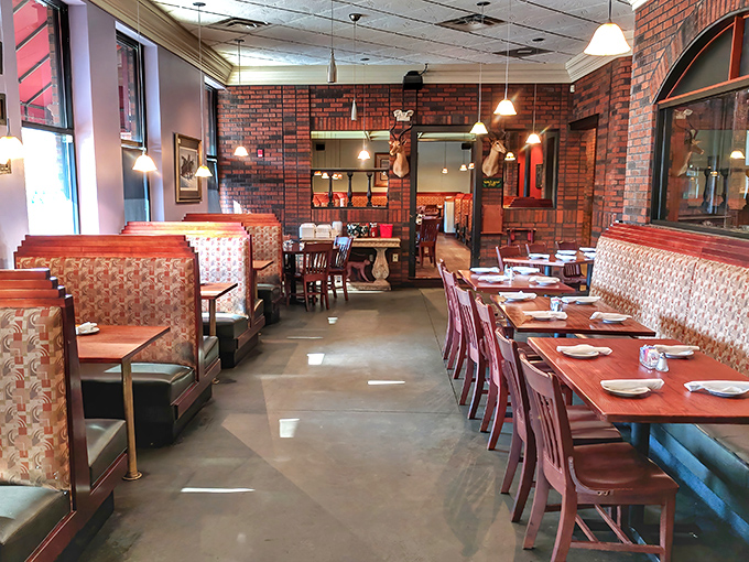 Inside, exposed brick walls and warm lighting create that perfect "special but comfortable" vibe—where anniversary celebrations and Tuesday night cravings feel equally at home.