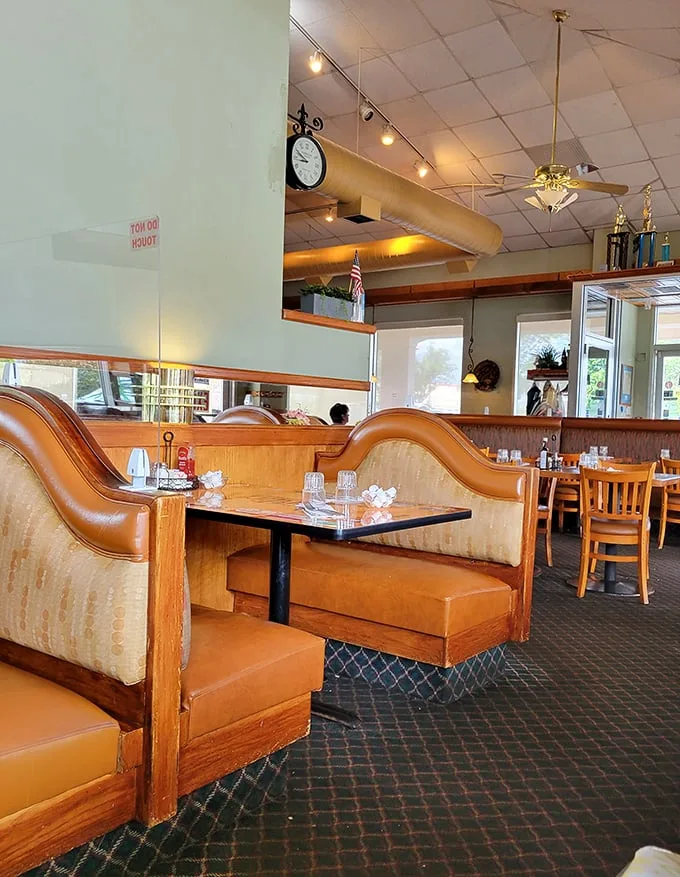 Those caramel-colored booths have witnessed countless family gatherings, first dates, and the silent satisfaction of perfectly executed breakfast fare.