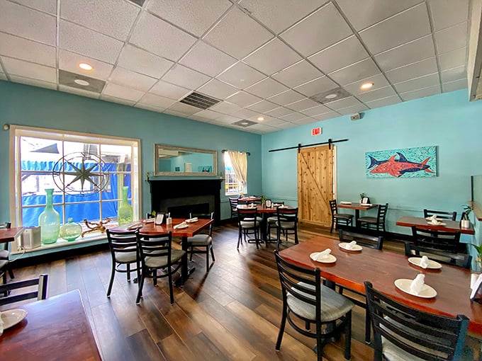 That turquoise wall color says "beach house," but the crowd says "this is where locals actually eat."