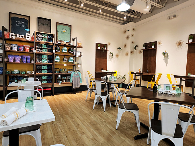 Mid-century modern meets Southern comfort in this airy space where metal chairs, wooden tables, and starburst decorations create the perfect backdrop for breakfast magic.