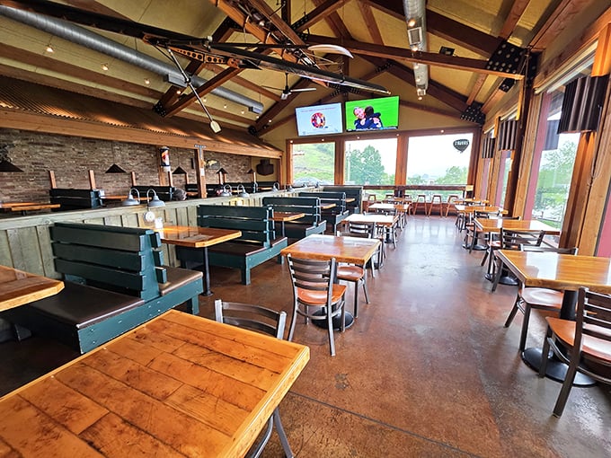 Rustic wooden beams meet modern comfort inside Skeeter's, where every table offers the perfect vantage point for both serious eating and casual conversation.