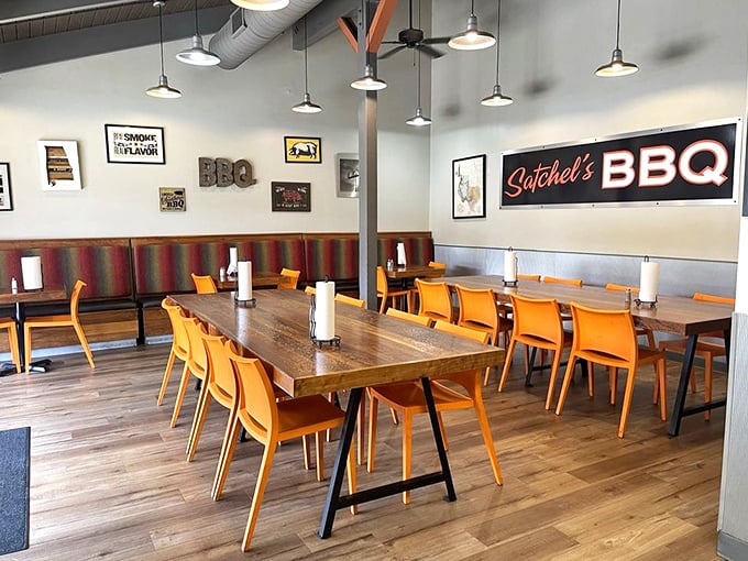 Community tables and bright orange chairs set the stage for what matters most here—the meat. No white tablecloths necessary when the brisket does all the talking.