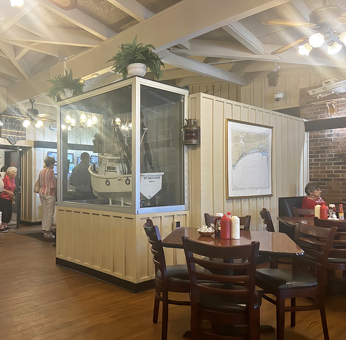 Nautical charm meets cozy dining – the model boat display and wood-paneled walls create that perfect "I've discovered something special" atmosphere.