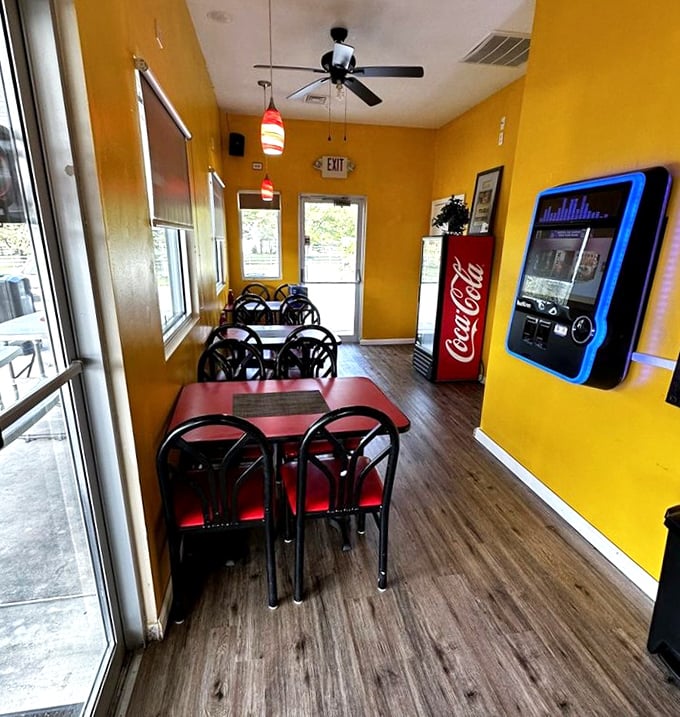 Sunshine-yellow walls and simple furnishings tell you everything about priorities here: all the creativity goes straight to the plate, not the décor.