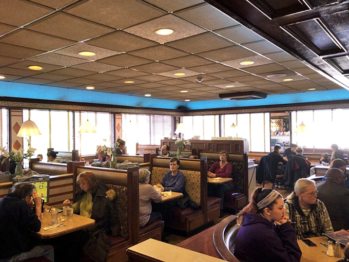 Classic diner geometry at its finest—where vinyl booths become thrones and every table feels like the best seat in the house.