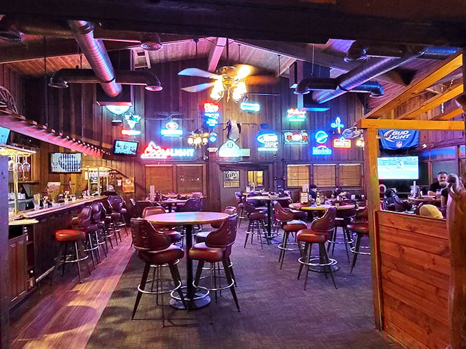 Step inside and you're transported to the Old West—neon beer signs and wooden walls creating the perfect backdrop for serious meat consumption.