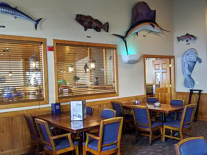 Fish tales come to life on these walls, where mounted catches keep watchful eyes on diners enjoying the warm, wood-paneled embrace of Old Florida charm.