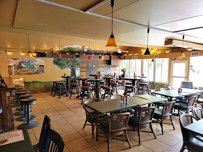 Inside, the casual dining room balances rustic charm with lakeside views. Those pendant lights have witnessed countless "first bite" expressions of delighted surprise.