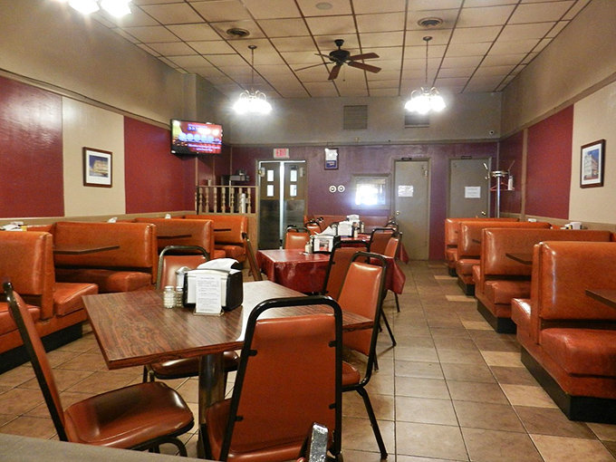 Classic red vinyl booths and no-nonsense tables create the perfect backdrop for comfort food conversations. Nostalgia comes standard with every meal.