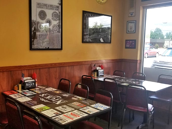 Classic wood paneling and newspaper-topped tables – where conversations flow as freely as the ketchup. Nostalgia you can actually taste.