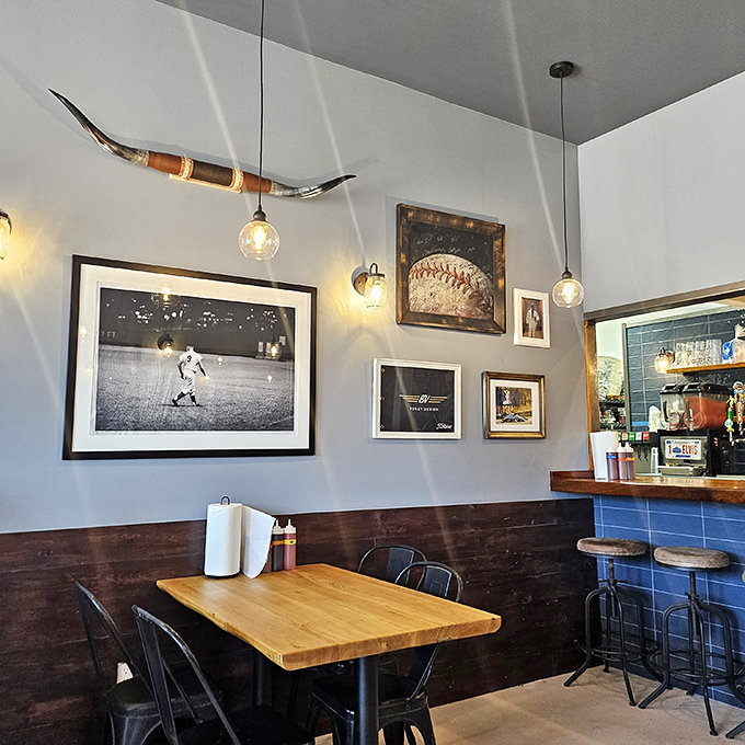 Longhorns on the wall and pendant lights overhead—this isn't just decoration, it's a promise of authentic barbecue in stylish Venice digs.