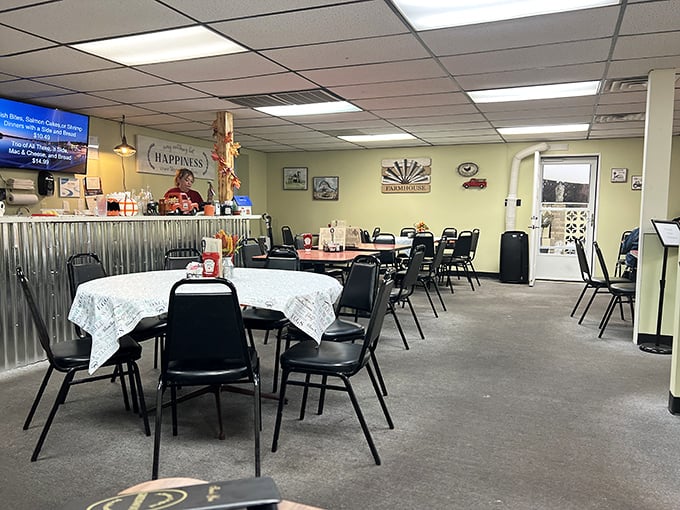 No designer chandeliers or marble floors here—just honest tables where culinary magic happens. That "HAPPINESS" sign isn't just decoration; it's a promise.