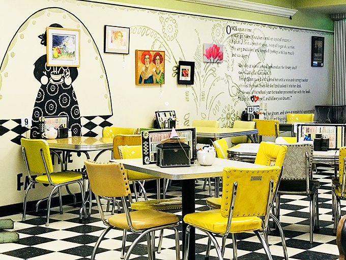 Sunny yellow chairs pop against the classic checkered floor, while whimsical wall art tells stories you'll want to hear over second cups of coffee.