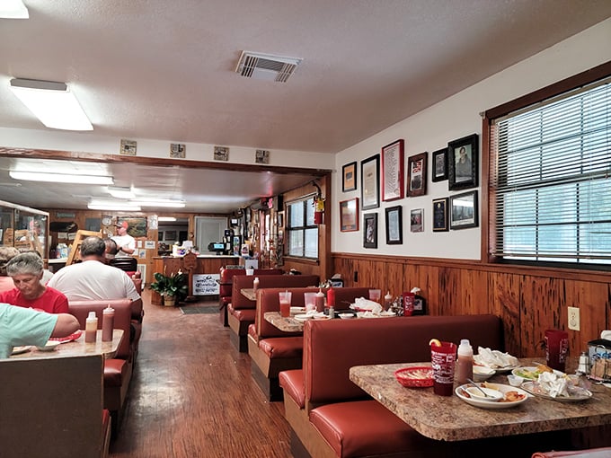 Red vinyl booths, wood-paneled walls, and decades of memories create the kind of authentic atmosphere money can't buy and chain restaurants can't replicate.