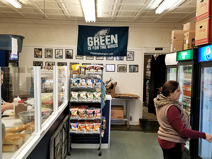 Inside, the Eagles flag proudly declares "Green is for the Birds" – because in Philly, sandwich loyalty is only rivaled by sports devotion.
