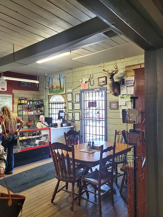 Where mounted deer heads and wooden tables tell you this isn't some corporate food concept, but a place where real Missouri happens daily.