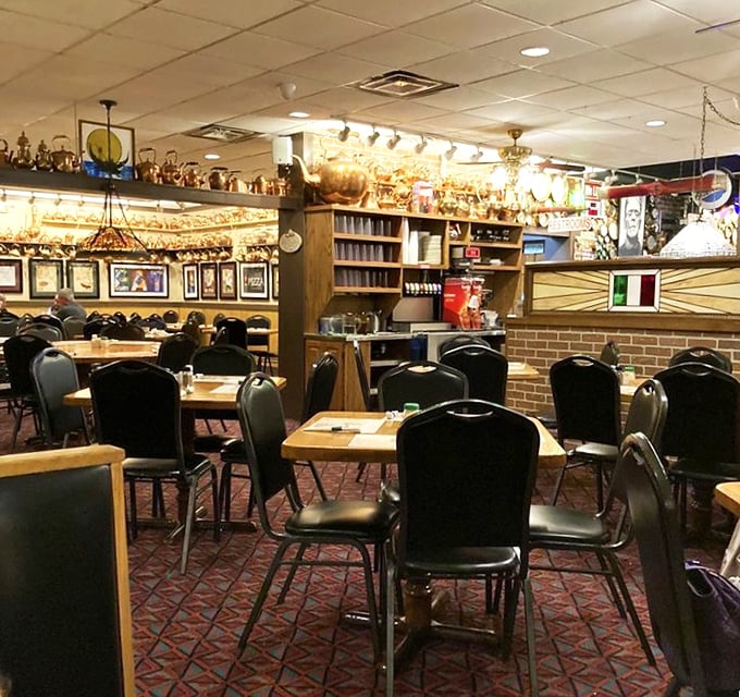 Inside, copper pots and warm lighting create that "Nonna's dining room expanded to seat 50" vibe that makes you instantly feel like family.